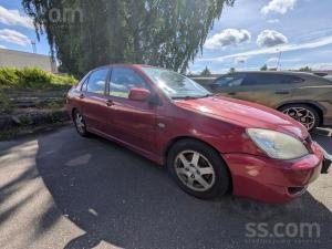 Red Mitsubishi Lancer 2007 in Riga, with an engine capacity of 1.60 L and mileage of 247 thousand km for 800 €, photo 7 on AUTOMOTO.COM.LV