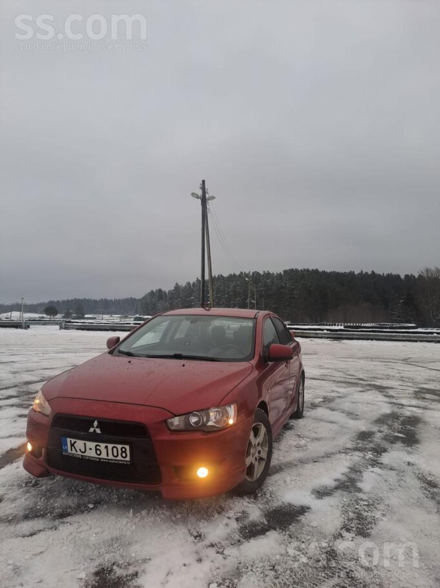 Red Mitsubishi Lancer 2008 in Valmiera, with an engine capacity of 2.00 L and mileage of 0 thousand km for 3900 €, photo 2 on AUTOMOTO.COM.LV
