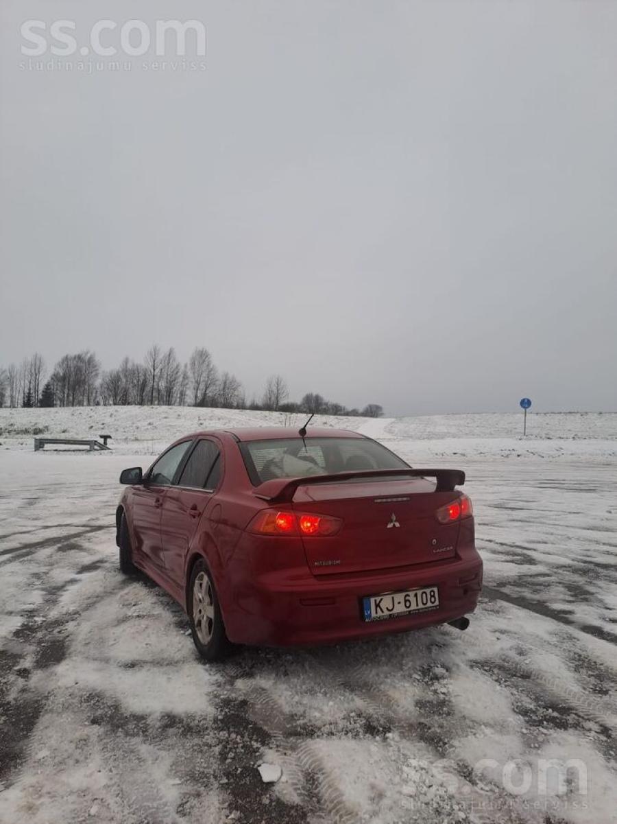 Red Mitsubishi Lancer 2008 in Valmiera, with an engine capacity of 2.00 L and mileage of 0 thousand km for 3900 €, photo 4 on AUTOMOTO.COM.LV