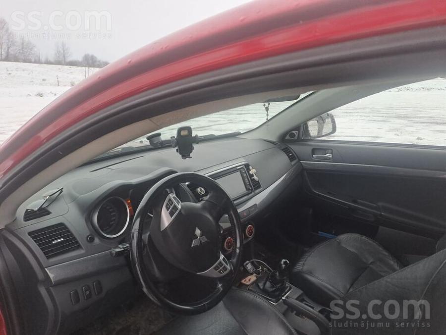Red Mitsubishi Lancer 2008 in Valmiera, with an engine capacity of 2.00 L and mileage of 0 thousand km for 3900 €, photo 6 on AUTOMOTO.COM.LV