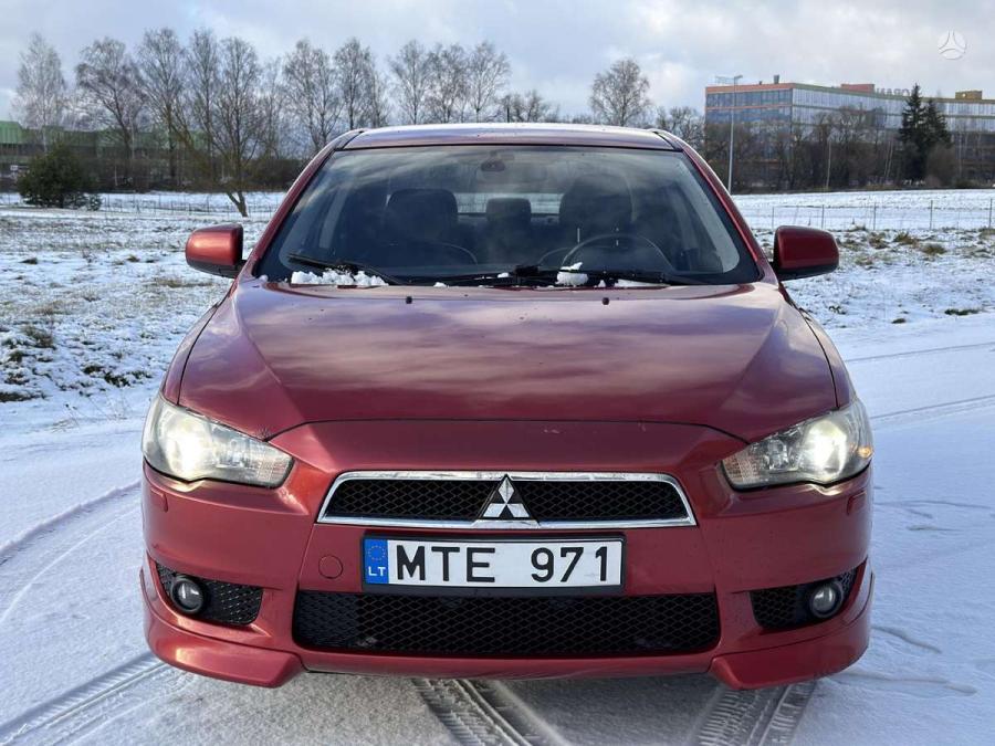 Sarkans Mitsubishi Lancer 2008 Viļņa, ar dzinēja tilpumu 1.80 L un nobraukumu 257 tūkst. km par 2650 €, foto 4 vietnē AUTOMOTO.COM.LV