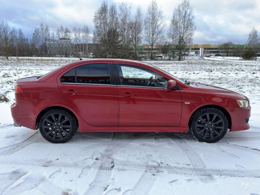 Sarkans Mitsubishi Lancer 2008 Viļņa, ar dzinēja tilpumu 1.80 L un nobraukumu 257 tūkst. km par 2650 €, foto 9 vietnē AUTOMOTO.COM.LV