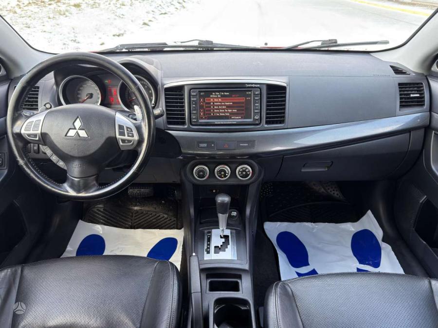 Sarkans Mitsubishi Lancer 2008 Viļņa, ar dzinēja tilpumu 1.80 L un nobraukumu 257 tūkst. km par 2650 €, foto 26 vietnē AUTOMOTO.COM.LV