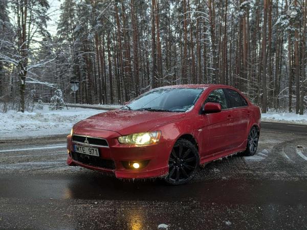 Sarkans Mitsubishi Lancer 2008 Viļņa, ar dzinēja tilpumu 1.80 L un nobraukumu 259 tūkst. km par 2900 €, foto 1 vietnē AUTOMOTO.COM.LV