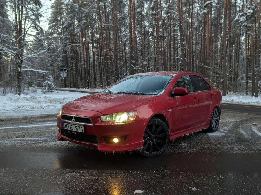 Red Mitsubishi Lancer 2008 in Vilnius, with an engine capacity of 1.80 L and mileage of 259 thousand km for 2900 €, photo 1 on AUTOMOTO.COM.LV