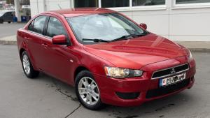 Sarkans Mitsubishi Lancer 2008 Viļņa, ar dzinēja tilpumu 1.80 L un nobraukumu 257 tūkst. km par 1950 €, foto  vietnē AUTOMOTO.COM.LV