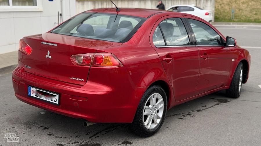 Sarkans Mitsubishi Lancer 2008 Viļņa, ar dzinēja tilpumu 1.80 L un nobraukumu 257 tūkst. km par 1950 €, foto 4 vietnē AUTOMOTO.COM.LV