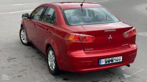 Sarkans Mitsubishi Lancer 2008 Viļņa, ar dzinēja tilpumu 1.80 L un nobraukumu 257 tūkst. km par 1950 €, foto 5 vietnē AUTOMOTO.COM.LV