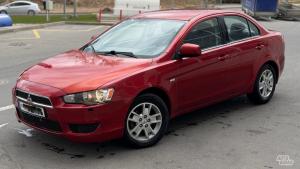 Sarkans Mitsubishi Lancer 2008 Viļņa, ar dzinēja tilpumu 1.80 L un nobraukumu 257 tūkst. km par 1950 €, foto 6 vietnē AUTOMOTO.COM.LV