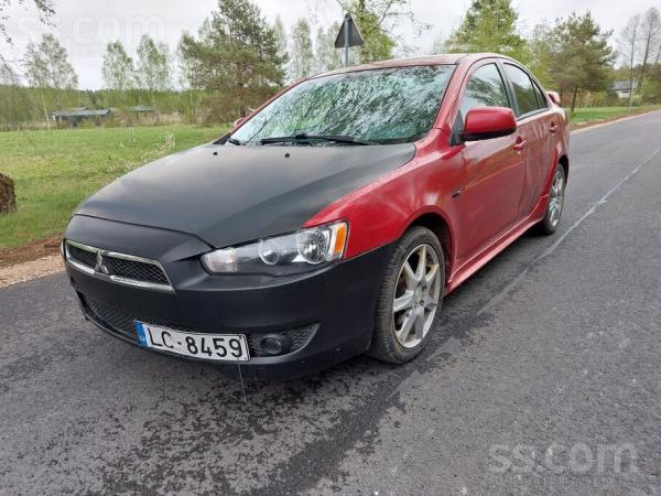 Sarkans Mitsubishi Lancer 2008 Rīga, ar dzinēja tilpumu 2.00 L un nobraukumu 405 tūkst. km par 1590 €, foto 1 vietnē AUTOMOTO.COM.LV