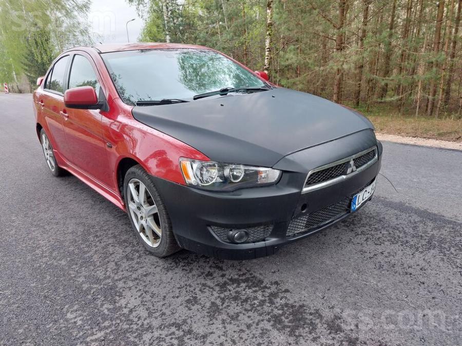 Sarkans Mitsubishi Lancer 2008 Rīga, ar dzinēja tilpumu 2.00 L un nobraukumu 405 tūkst. km par 1590 €, foto 3 vietnē AUTOMOTO.COM.LV