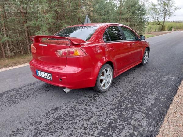 Sarkans Mitsubishi Lancer 2008 Rīga, ar dzinēja tilpumu 2.00 L un nobraukumu 405 tūkst. km par 1590 €, foto 3 vietnē AUTOMOTO.COM.LV