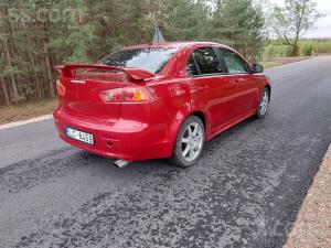 Sarkans Mitsubishi Lancer 2008 Rīga, ar dzinēja tilpumu 2.00 L un nobraukumu 405 tūkst. km par 1590 €, foto 4 vietnē AUTOMOTO.COM.LV
