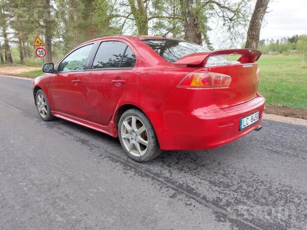 Sarkans Mitsubishi Lancer 2008 Rīga, ar dzinēja tilpumu 2.00 L un nobraukumu 405 tūkst. km par 1590 €, foto 4 vietnē AUTOMOTO.COM.LV