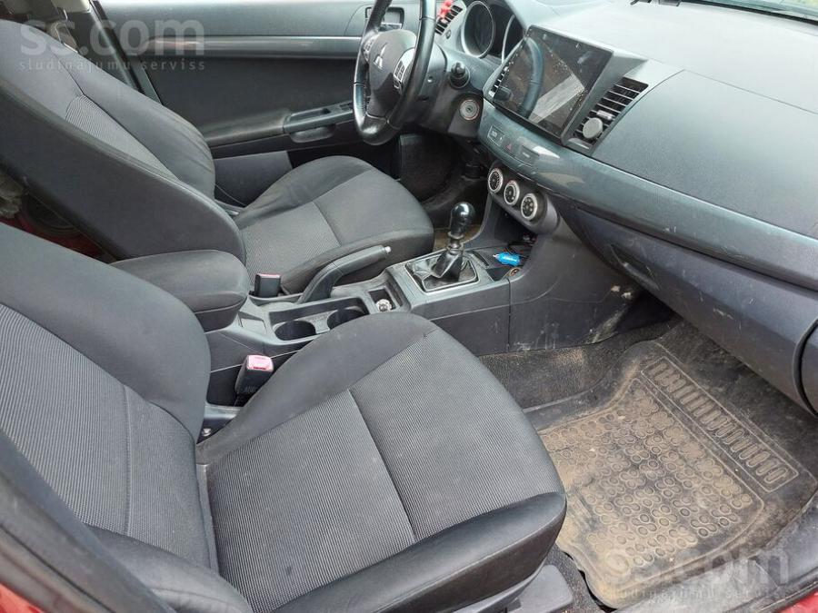 Sarkans Mitsubishi Lancer 2008 Rīga, ar dzinēja tilpumu 2.00 L un nobraukumu 405 tūkst. km par 1590 €, foto 7 vietnē AUTOMOTO.COM.LV