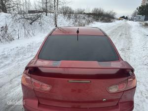 Red Mitsubishi Lancer 2008 in Tallinn, with an engine capacity of 1.80 L and mileage of 333 thousand km for 3400 €, photo 5 on AUTOMOTO.COM.LV