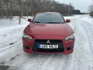 Red Mitsubishi Lancer 2008 in Tallinn, with an engine capacity of 1.80 L and mileage of 333 thousand km for 3400 €, photo 8 on AUTOMOTO.COM.LV
