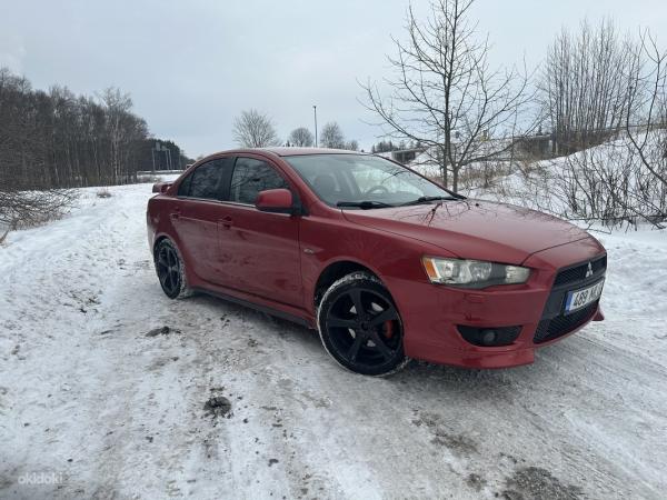 Sarkans Mitsubishi Lancer 2008 Tallina, ar dzinēja tilpumu 1.80 L un nobraukumu 333 tūkst. km par 3400 €, foto 9 vietnē AUTOMOTO.COM.LV