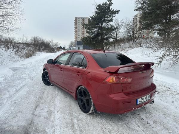 Sarkans Mitsubishi Lancer 2008 Tallina, ar dzinēja tilpumu 1.80 L un nobraukumu 333 tūkst. km par 3400 €, foto 10 vietnē AUTOMOTO.COM.LV