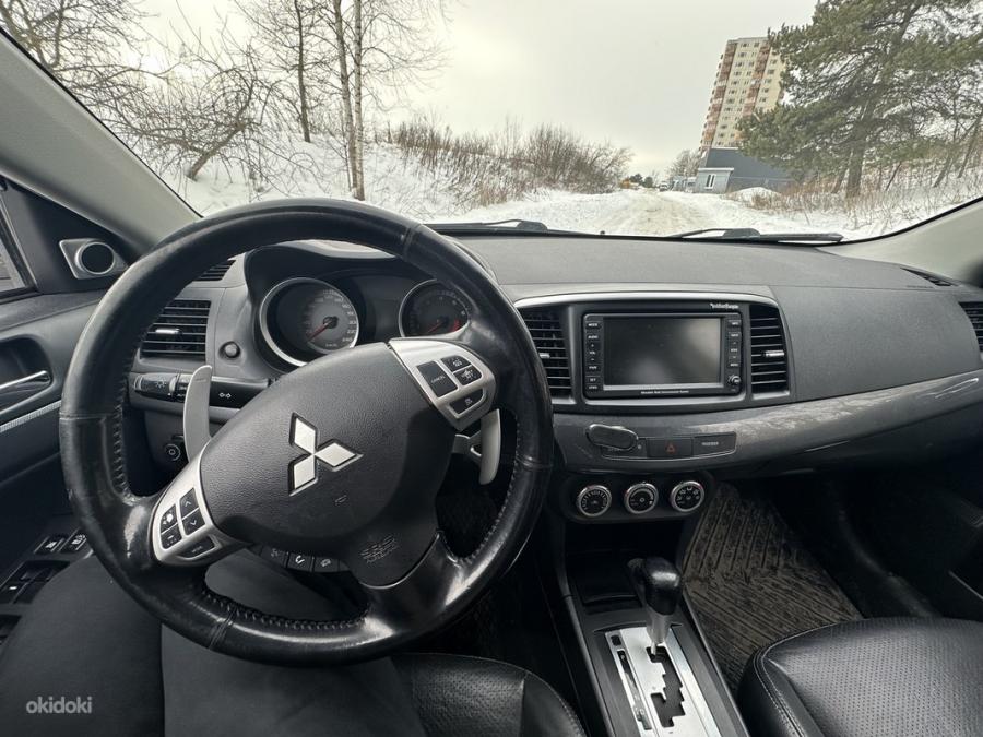 Red Mitsubishi Lancer 2008 in Tallinn, with an engine capacity of 1.80 L and mileage of 333 thousand km for 3400 €, photo 15 on AUTOMOTO.COM.LV