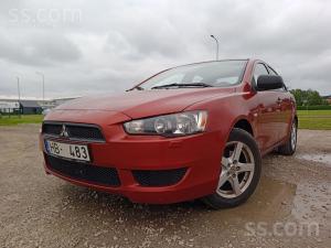 Sarkans Mitsubishi Lancer 2008 Rīga, ar dzinēja tilpumu 1.50 L un nobraukumu 245 tūkst. km par 3000 €, foto  vietnē AUTOMOTO.COM.LV