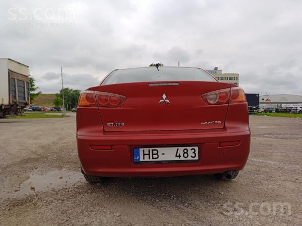 Sarkans Mitsubishi Lancer 2008 Rīga, ar dzinēja tilpumu 1.50 L un nobraukumu 245 tūkst. km par 3000 €, foto 4 vietnē AUTOMOTO.COM.LV