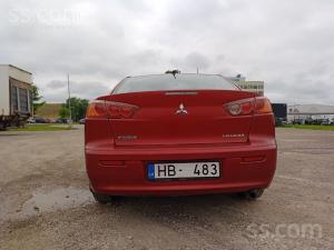 Sarkans Mitsubishi Lancer 2008 Rīga, ar dzinēja tilpumu 1.50 L un nobraukumu 245 tūkst. km par 3000 €, foto 5 vietnē AUTOMOTO.COM.LV