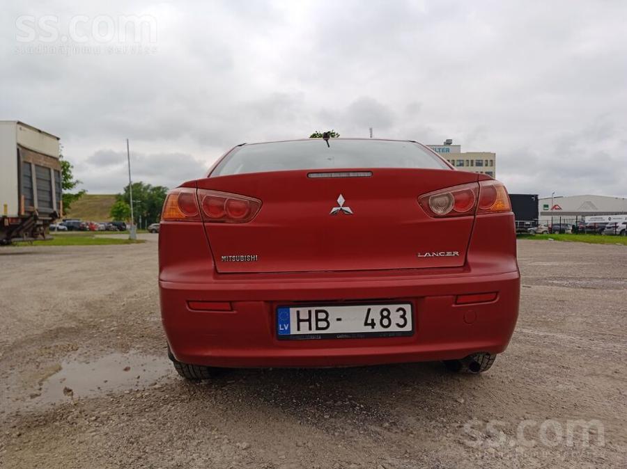 Sarkans Mitsubishi Lancer 2008 Rīga, ar dzinēja tilpumu 1.50 L un nobraukumu 245 tūkst. km par 3000 €, foto 5 vietnē AUTOMOTO.COM.LV