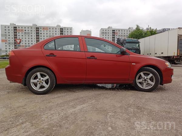 Sarkans Mitsubishi Lancer 2008 Rīga, ar dzinēja tilpumu 1.50 L un nobraukumu 245 tūkst. km par 3000 €, foto 5 vietnē AUTOMOTO.COM.LV