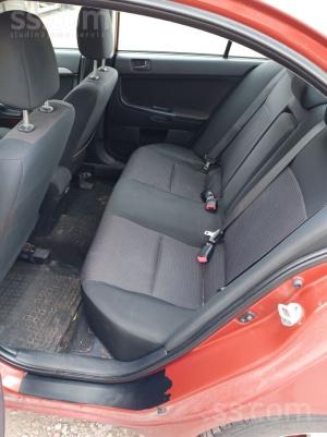 Sarkans Mitsubishi Lancer 2008 Rīga, ar dzinēja tilpumu 1.50 L un nobraukumu 245 tūkst. km par 3000 €, foto 9 vietnē AUTOMOTO.COM.LV