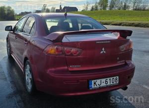 Red Mitsubishi Lancer 2008 in Valmiera, with an engine capacity of 2.00 L and mileage of 0 thousand km for 2500 €, photo 4 on AUTOMOTO.COM.LV