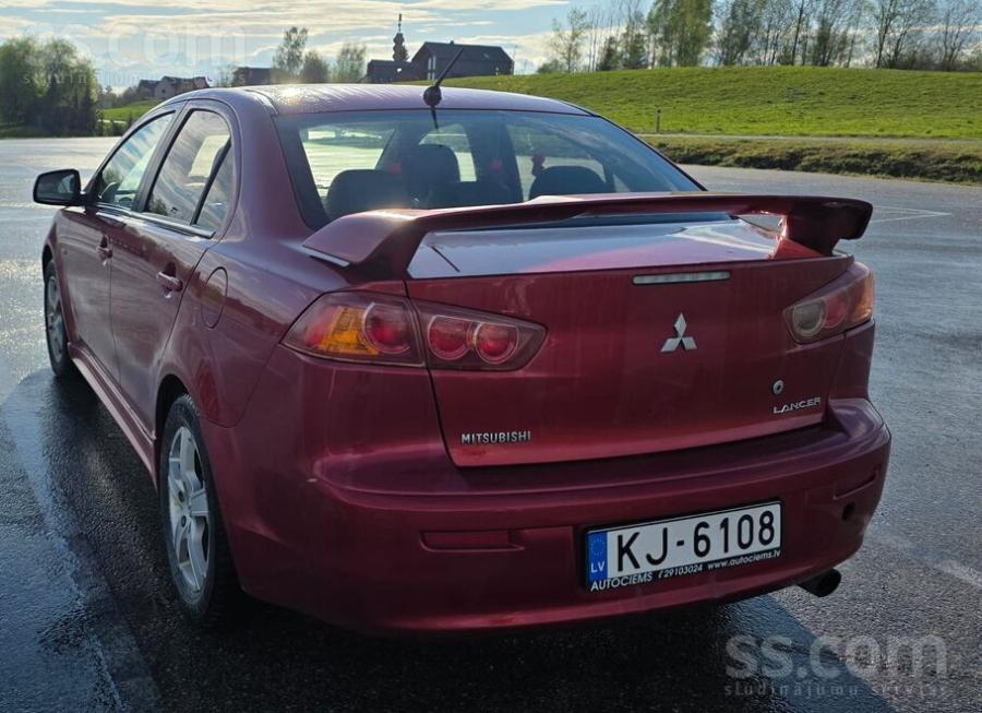 Red Mitsubishi Lancer 2008 in Valmiera, with an engine capacity of 2.00 L and mileage of 0 thousand km for 2500 €, photo 4 on AUTOMOTO.COM.LV