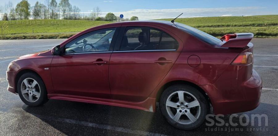 Red Mitsubishi Lancer 2008 in Valmiera, with an engine capacity of 2.00 L and mileage of 0 thousand km for 2500 €, photo 5 on AUTOMOTO.COM.LV