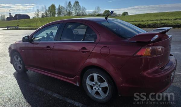Red Mitsubishi Lancer 2008 in Valmiera, with an engine capacity of 2.00 L and mileage of 0 thousand km for 2500 €, photo 5 on AUTOMOTO.COM.LV