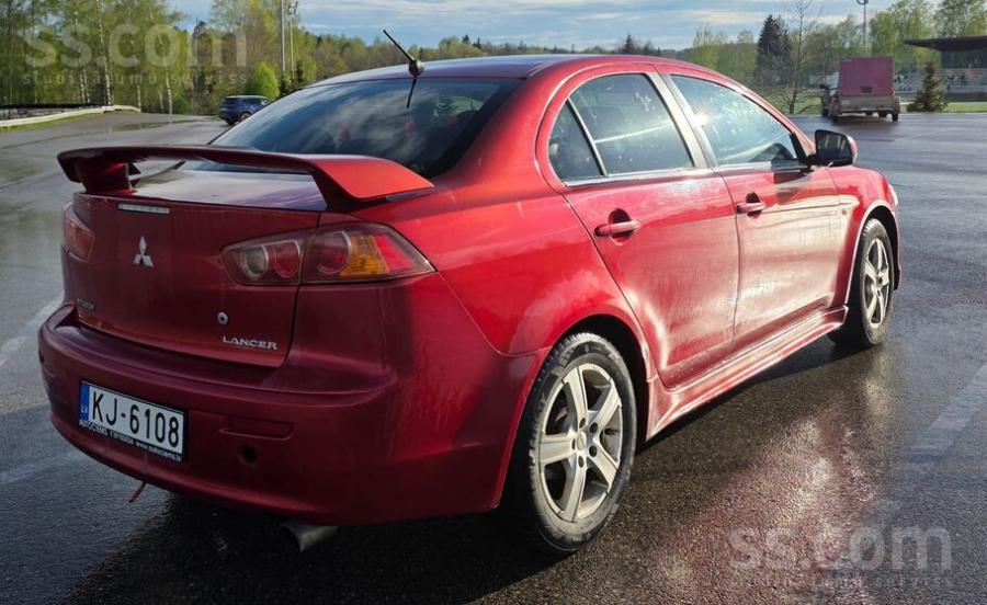 Red Mitsubishi Lancer 2008 in Valmiera, with an engine capacity of 2.00 L and mileage of 0 thousand km for 2500 €, photo 7 on AUTOMOTO.COM.LV