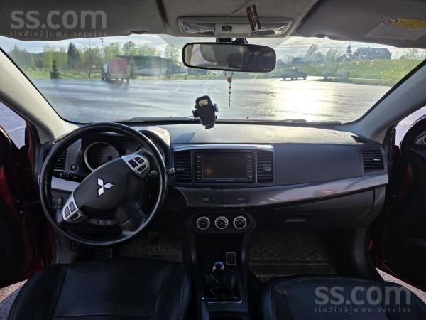 Red Mitsubishi Lancer 2008 in Valmiera, with an engine capacity of 2.00 L and mileage of 0 thousand km for 2500 €, photo 7 on AUTOMOTO.COM.LV