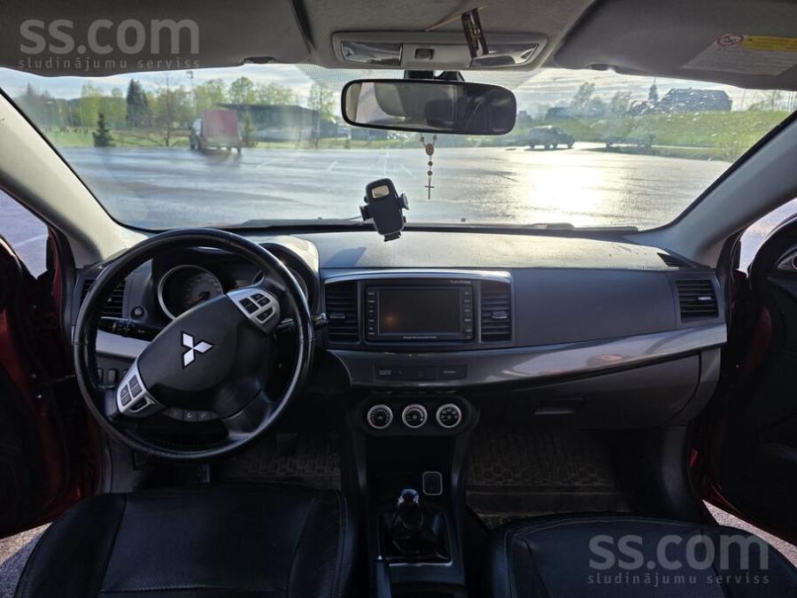 Red Mitsubishi Lancer 2008 in Valmiera, with an engine capacity of 2.00 L and mileage of 0 thousand km for 2500 €, photo 8 on AUTOMOTO.COM.LV