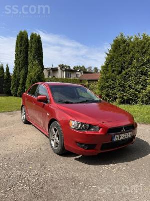 Красный Мицубиси Лансер 2008 в Рига, объемом двигателя 1.80 л и пробегом 272 тыс. км за 2200 €, фото  на AUTOMOTO.COM.LV