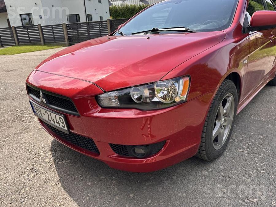 Red Mitsubishi Lancer 2008 in Riga, with an engine capacity of 1.80 L and mileage of 272 thousand km for 2200 €, photo 5 on AUTOMOTO.COM.LV