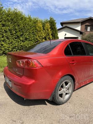 Red Mitsubishi Lancer 2008 in Riga, with an engine capacity of 1.80 L and mileage of 272 thousand km for 2200 €, photo 6 on AUTOMOTO.COM.LV