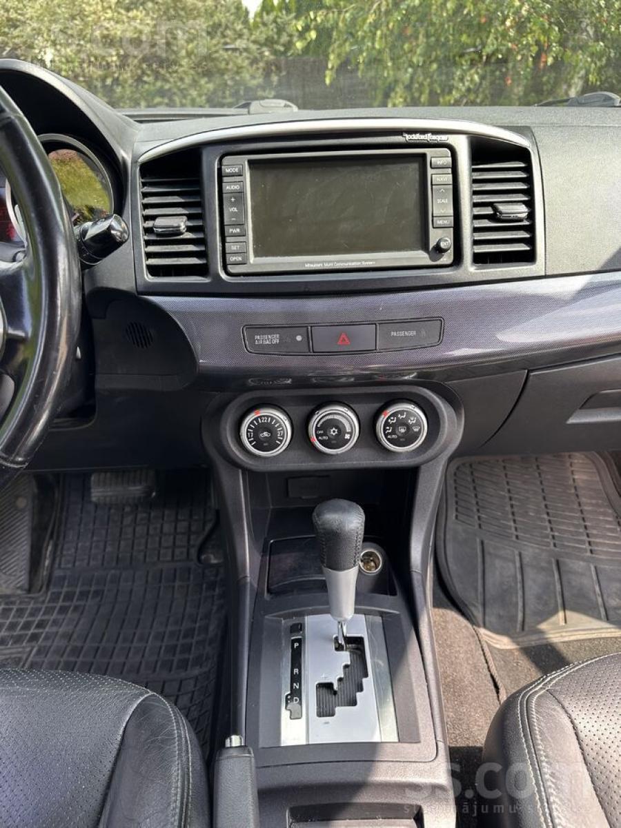 Red Mitsubishi Lancer 2008 in Riga, with an engine capacity of 1.80 L and mileage of 272 thousand km for 2200 €, photo 12 on AUTOMOTO.COM.LV