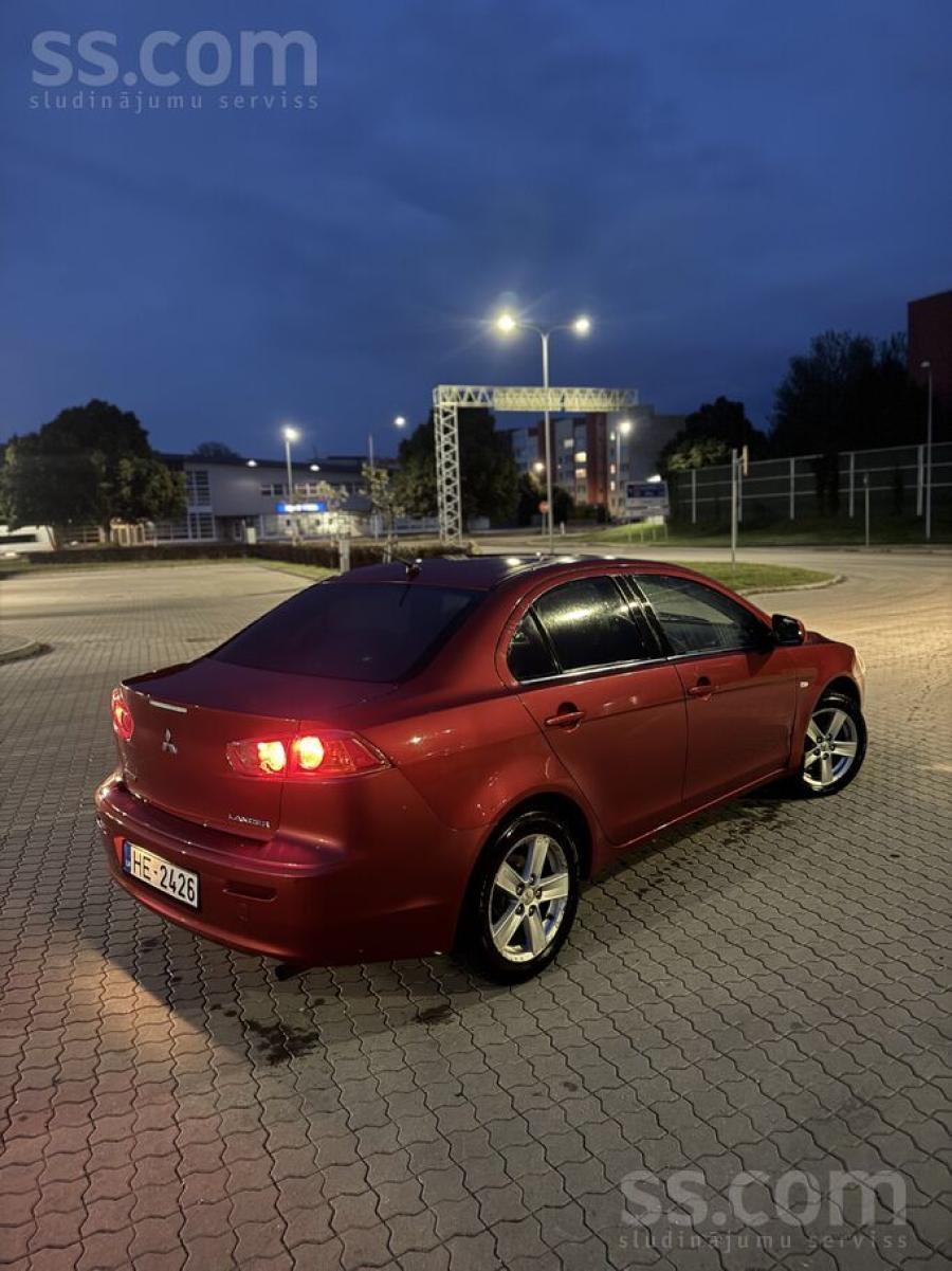Red Mitsubishi Lancer 2008 in Liepaja, with an engine capacity of 1.50 L and mileage of 0 thousand km for 1000 €, photo 3 on AUTOMOTO.COM.LV
