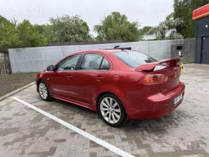 Sarkans Mitsubishi Lancer 2009 Rīga, ar dzinēja tilpumu 1.80 L un nobraukumu 242 tūkst. km par 2800 €, foto 4 vietnē AUTOMOTO.COM.LV