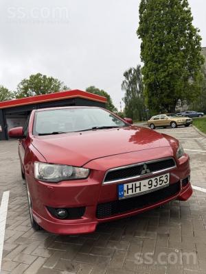 Sarkans Mitsubishi Lancer 2009 Rīga, ar dzinēja tilpumu 1.80 L un nobraukumu 242 tūkst. km par 2800 €, foto 7 vietnē AUTOMOTO.COM.LV
