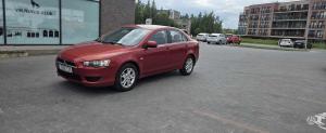 Sarkans Mitsubishi Lancer 2009 Viļņa, ar dzinēja tilpumu 1.80 L un nobraukumu 230 tūkst. km par 2150 €, foto  vietnē AUTOMOTO.COM.LV