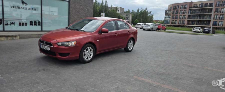 Red Mitsubishi Lancer 2009 in Vilnius, with an engine capacity of 1.80 L and mileage of 230 thousand km for 2150 €, photo 1 on AUTOMOTO.COM.LV