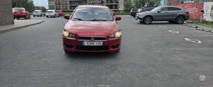 Red Mitsubishi Lancer 2009 in Vilnius, with an engine capacity of 1.80 L and mileage of 230 thousand km for 2150 €, photo 4 on AUTOMOTO.COM.LV