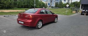 Red Mitsubishi Lancer 2009 in Vilnius, with an engine capacity of 1.80 L and mileage of 230 thousand km for 2150 €, photo 5 on AUTOMOTO.COM.LV
