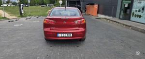 Red Mitsubishi Lancer 2009 in Vilnius, with an engine capacity of 1.80 L and mileage of 230 thousand km for 2150 €, photo 6 on AUTOMOTO.COM.LV