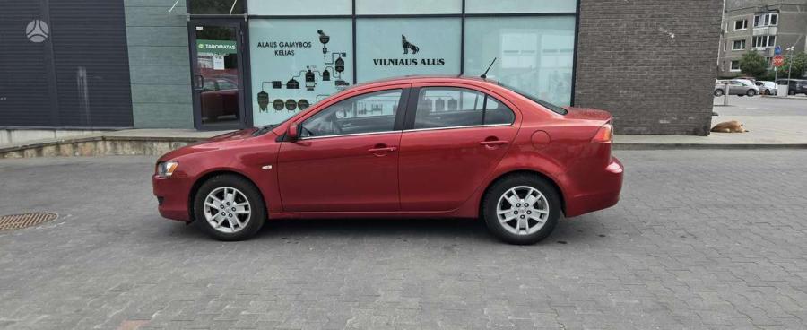 Red Mitsubishi Lancer 2009 in Vilnius, with an engine capacity of 1.80 L and mileage of 230 thousand km for 2150 €, photo 8 on AUTOMOTO.COM.LV